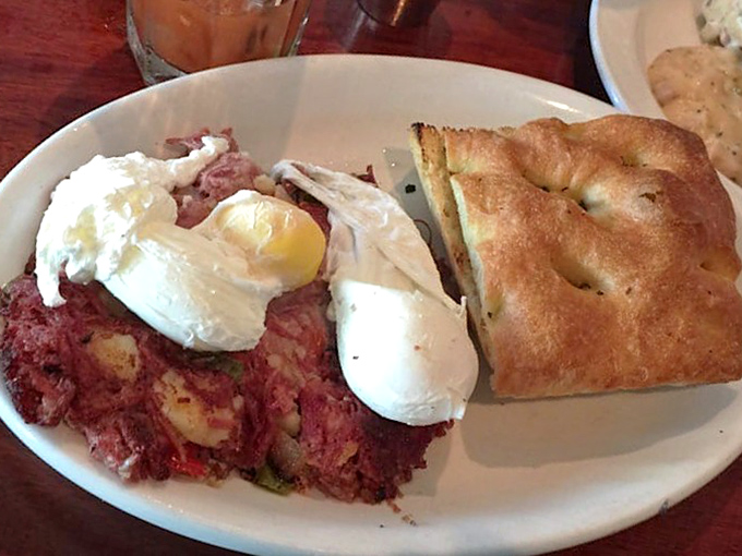 This variation pairs the legendary hash with focaccia bread, creating the ideal vehicle for sopping up every last bit of egg-enriched goodness.