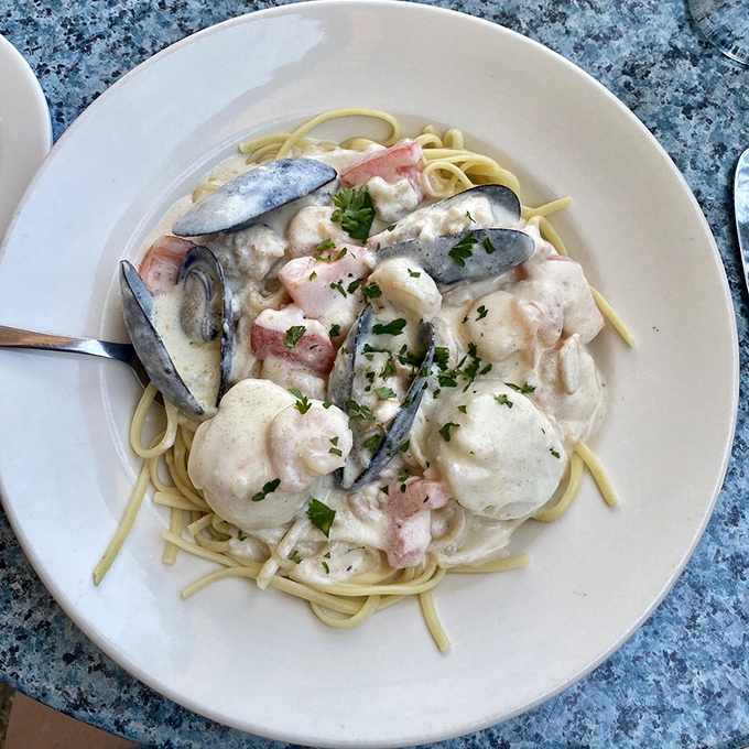 The Pescatore combines tender seafood treasures in a light, creamy sauce that lets Maine's coastal bounty shine through.