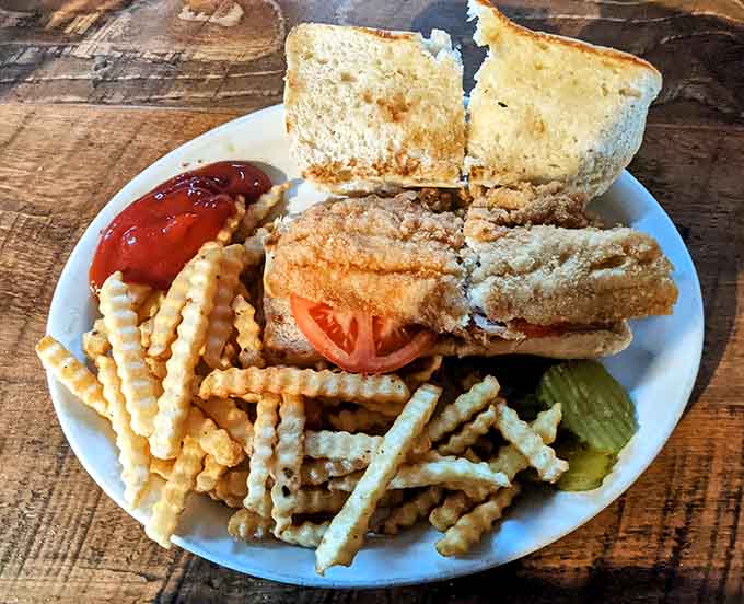 The fried walleye sandwich proves that greatness can be handheld, making excellence portable for the multitaskers among us.