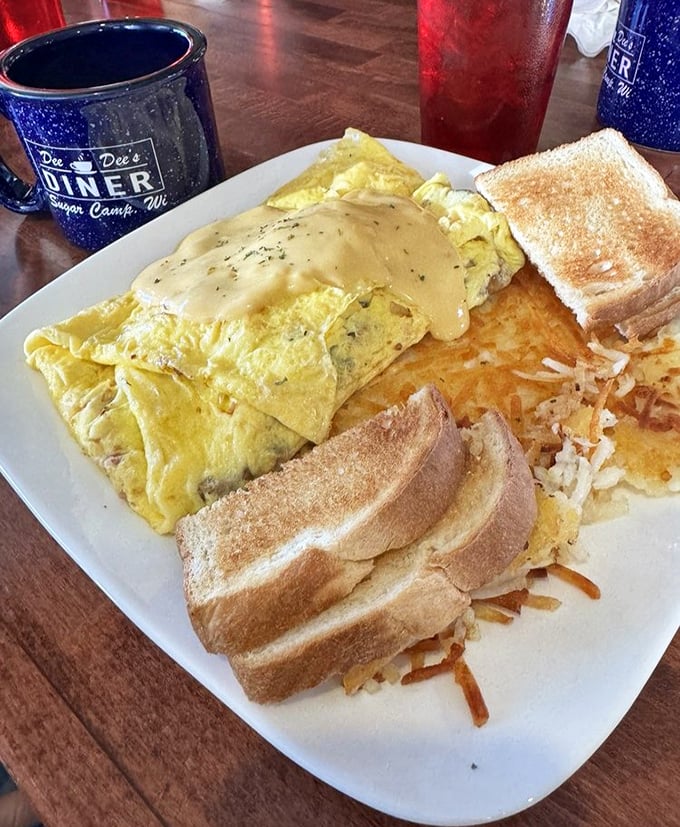 Breakfast with benefits &ndash; fluffy omelet draped in cheese sauce that would make a French chef reconsider their life choices.