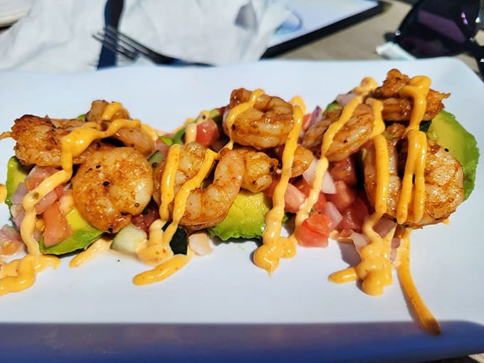 These avocado shrimp boats look like tiny flavor vessels sailing straight into your heart and stomach simultaneously.