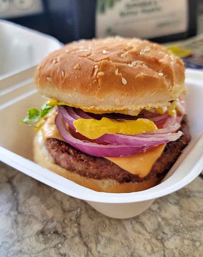 This burger stacks up with all the fixings, proving Doge Pizza's grill game is just as strong.