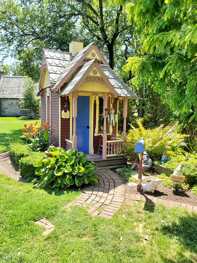This charming yellow dollhouse has better curb appeal than most full-sized homes on the market today.