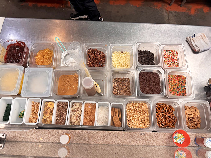 Behold, the artist's palette of donut delights! It's like Bob Ross went wild in a candy store, creating happy little accidents of deliciousness.