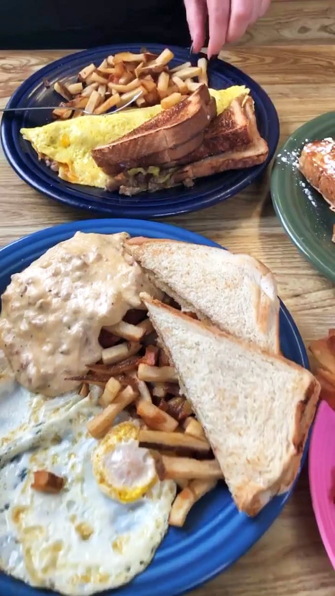 Generous portions on vibrant plates make every breakfast feel like a celebration worth waking up early for.