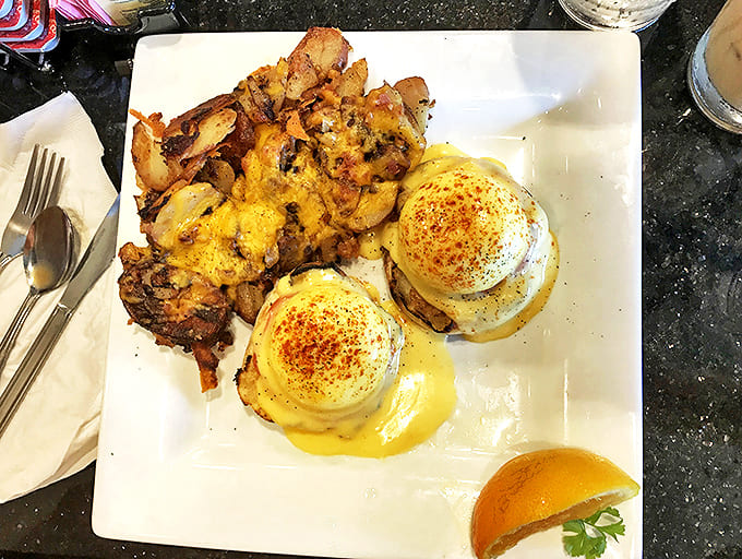 Eggs Benedict elevated to an art form &ndash; perfectly poached eggs nestled on English muffins, draped in hollandaise that's basically liquid gold.