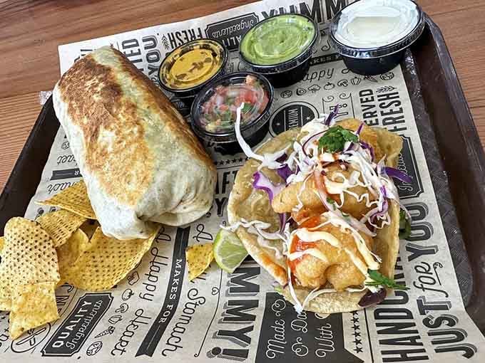 The burrito stands tall next to delicate shrimp tacos, proving El Sazon can handle both hearty and refined with equal skill.