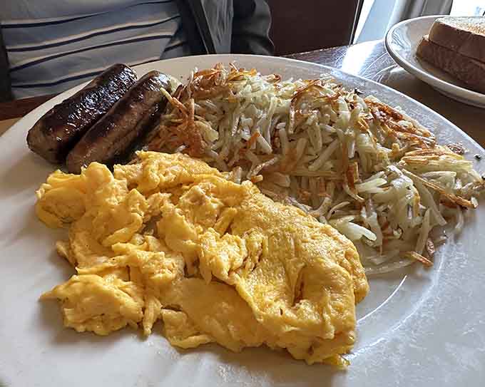 Fluffy scrambled eggs, savory sausages, and those famous hash browns create the ultimate breakfast power trio.