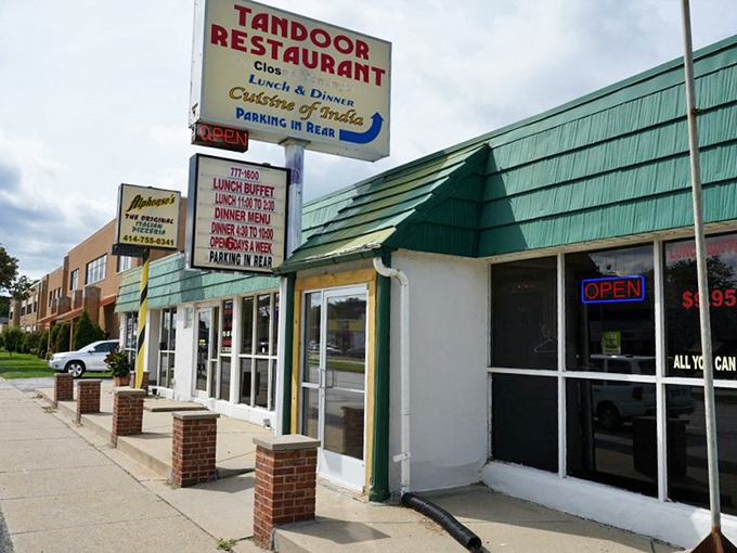 No need for fancy frills here. This sign promises "Cuisine of India," and boy, does it deliver on that promise!