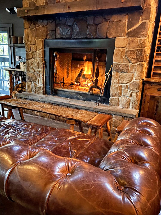 Nothing says "cozy Maine evening" quite like a roaring fireplace and a buttery leather chair. It's the perfect spot to contemplate life's big questions... or just your next cocktail.