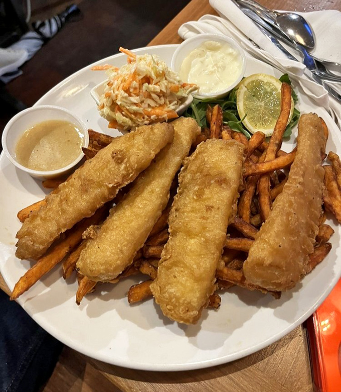 Beer-battered haddock breaks into large, moist flakes beside house-made tartar sauce that puts store-bought versions to shame.