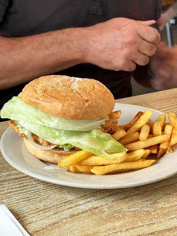 The fish sandwich doesn't need fancy toppings when the fish is this fresh &ndash; just crispy perfection on a bun with fries to match.