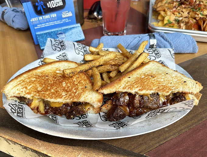 The Patty Melt delivers melted cheese and caramelized onions on toasted bread, proving that sometimes the classics are classic for a reason, especially with those addictive fries.