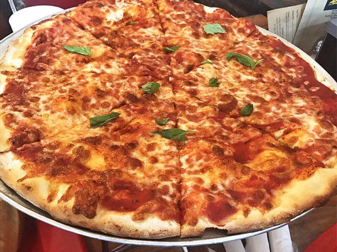 Sometimes simplicity is perfection – a classic cheese pizza with that ideal balance of tangy sauce and stretchy, bubbling mozzarella on a hand-tossed crust.