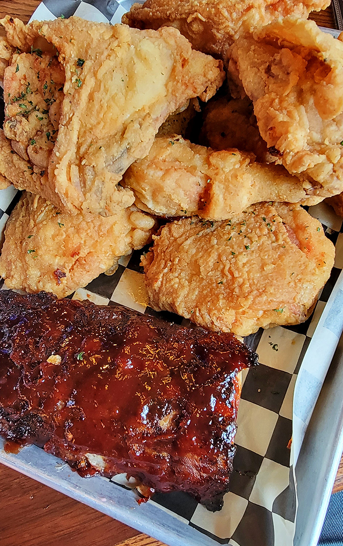 The star of the show: perfectly seasoned fried chicken with a crackling exterior that gives way to impossibly juicy meat within.