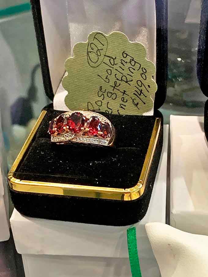 This garnet ring has probably been through more proposals, anniversaries, and family dramas than an entire season of Downton Abbey combined.