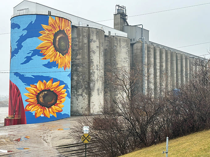 The back view reveals the mural's integration with the working waterfront, where art and industry coexist in surprising harmony.