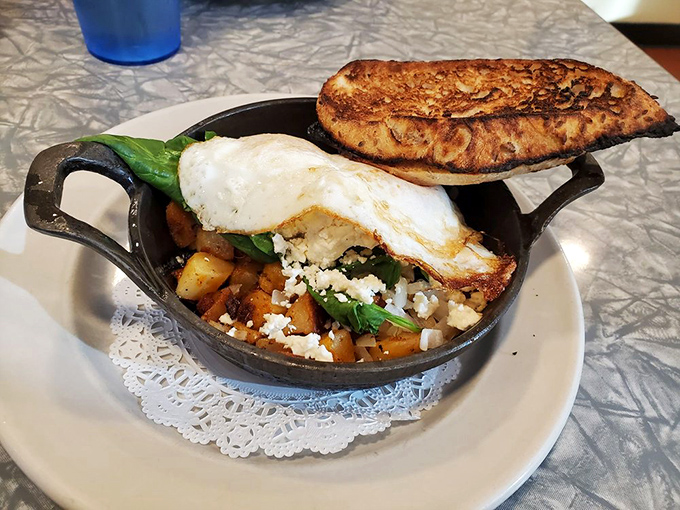 Feta cheese and fresh spinach give the Greek Skillet its Mediterranean personality, a worldly breakfast served in the heart of Vermont.