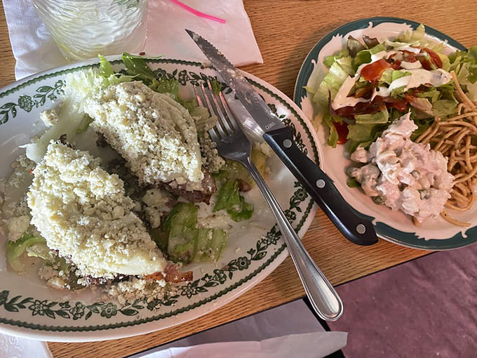 That breaded fish stretches across the plate like it's showing off, while the loaded spud steals scenes shamelessly.
