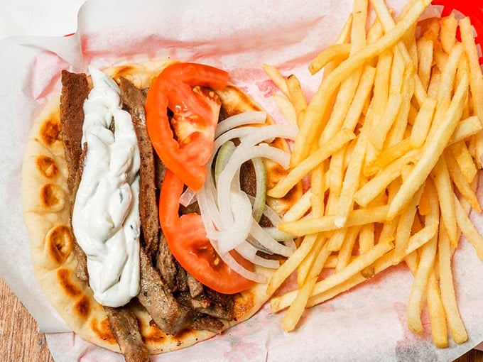 Greece lightning! This gyro and fries combo is so good, it might just make you break out in spontaneous plate-smashing.