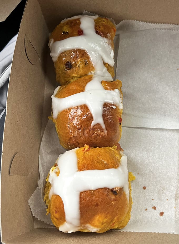 Hot cross buns arrive seasonally, bringing centuries of tradition and fruit-studded deliciousness to your table when you need them most.