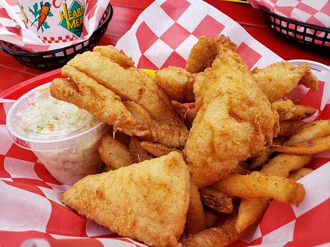 Fish and chips that would make the British jealous, featuring fresh haddock fried to absolute perfection with all the fixings.