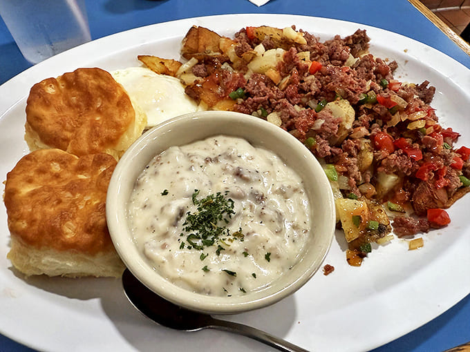 Breakfast champions start here: homemade corned beef hash with eggs and biscuits that would make your grandmother jealous.