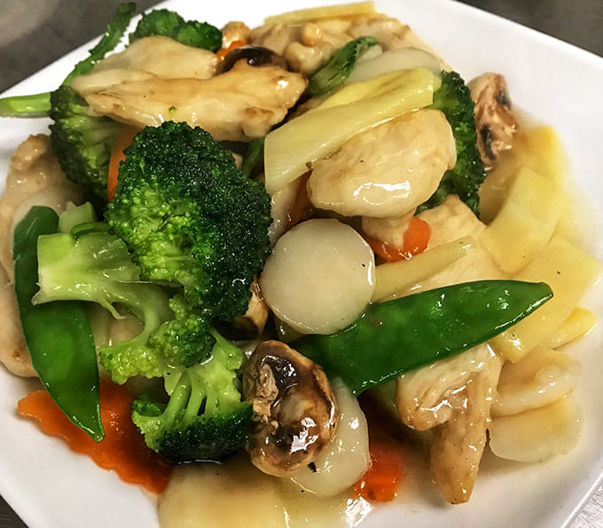 Moo goo gai pan offers a gentler side of Chinese cuisine, with tender chicken and crisp vegetables in a light sauce that comforts without overwhelming.