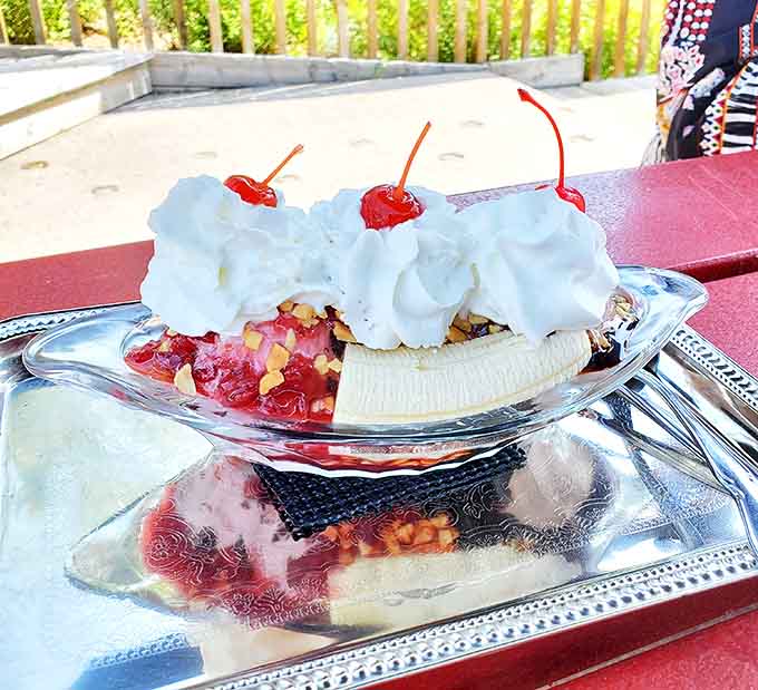 This isn't just a sundae &ndash; it's an architectural achievement of cream, fruit, and toppings that makes neighboring tables point and stare.