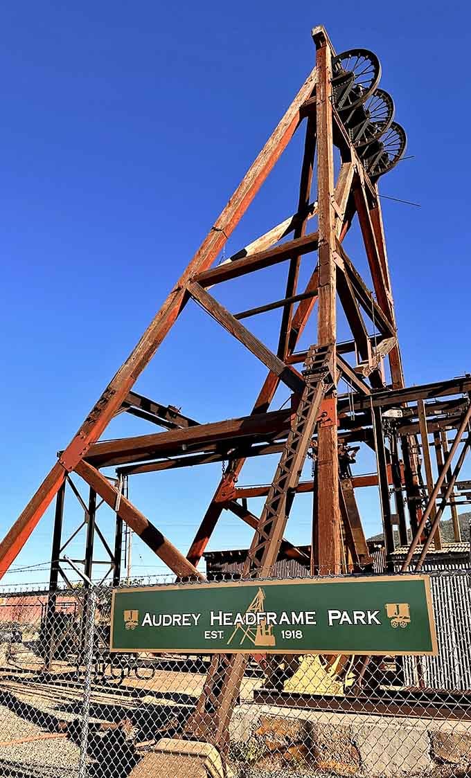 Audrey Headframe Park's towering mining structure dominates the landscape, a skeletal reminder of the industrial might that once defined this now-artistic community perched above the valley.