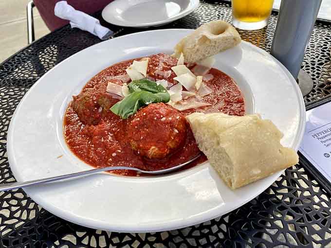 House-made meatballs swimming in sauce represent everything right about Italian comfort food, perfect for sharing or keeping all to yourself.