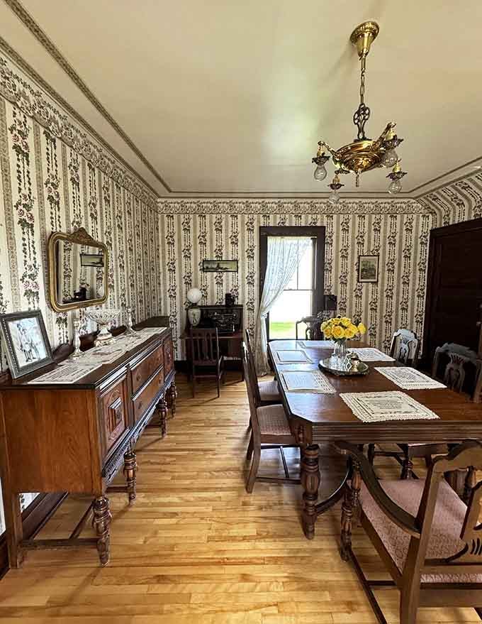 The formal dining room showcases the kind of middle-class comfort that defined small-town American life between the wars.