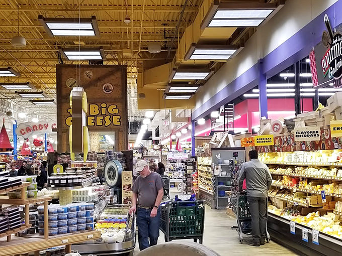 That giant cheese display holds hundreds of varieties from around the world, each one begging you to take it home.