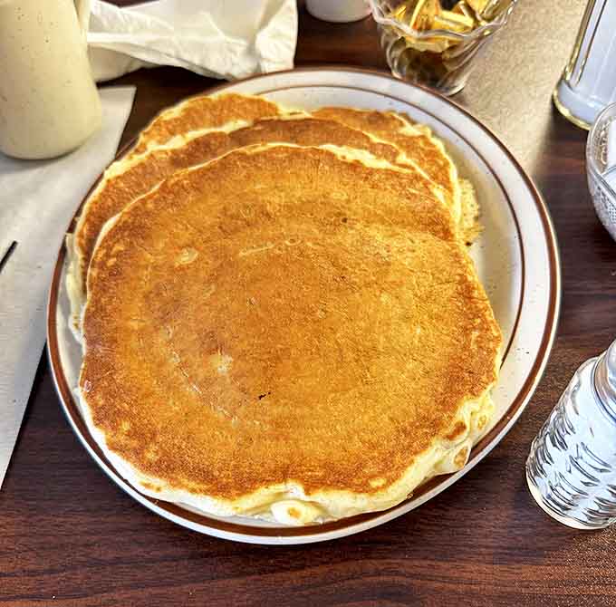 Pancakes so perfectly golden and fluffy, they could make a grown person weep tears of pure breakfast joy.
