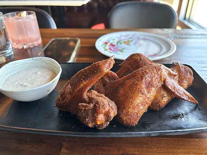 Crispy chicken wings arrive golden and glistening, ready to disappear faster than your willpower around good food.