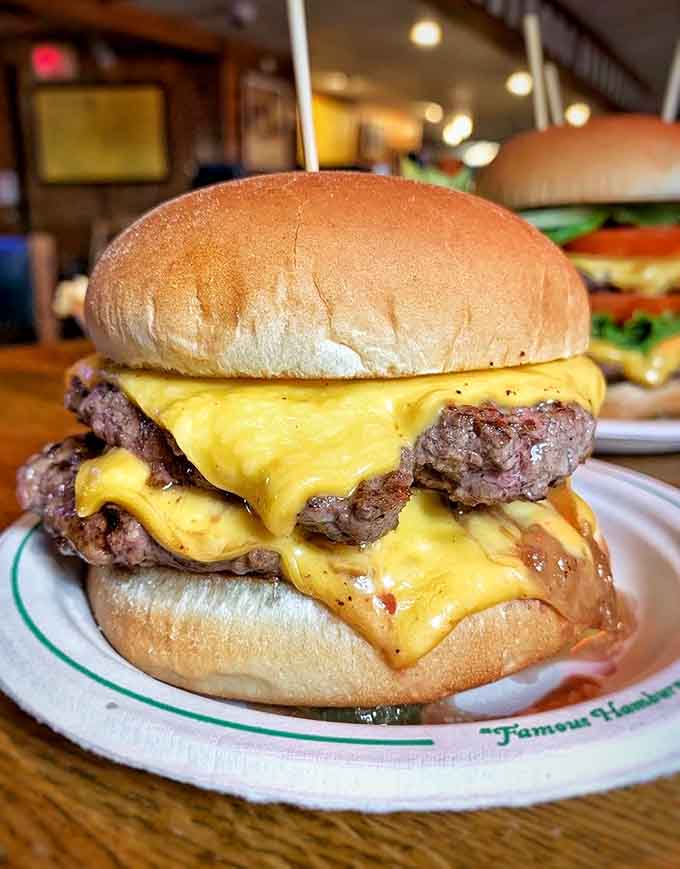When one patty isn't enough, the double cheeseburger steps up to deliver twice the beefy goodness, held together by a bun that's earned its place.