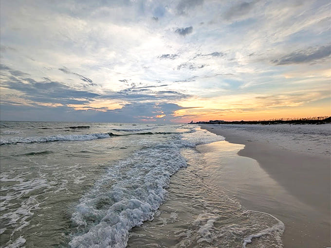 Gentle waves kiss the untouched sand, creating a meditative soundtrack that no spa playlist could ever match.