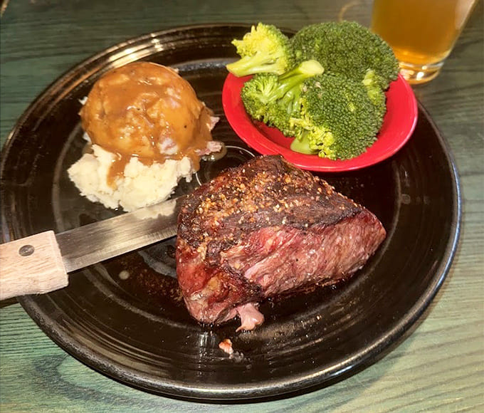 A perfectly cooked steak with all the fixings reminds you why this place earned its steakhouse reputation.