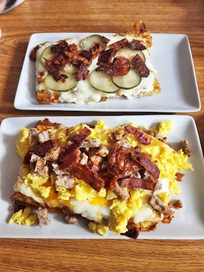 Meat Lovers Skillet: Breakfast reaches its final form with this savory masterpiece &ndash; eggs, bacon, and potatoes proving that mornings can indeed be magnificent.