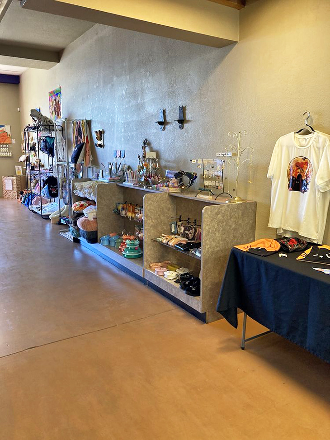 Cat lovers can take home a piece of El Jefe with merchandise ranging from stickers to locally crafted feline-themed treasures.