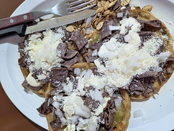 Picaditas topped with enough goodness to make you forget you ever counted calories.