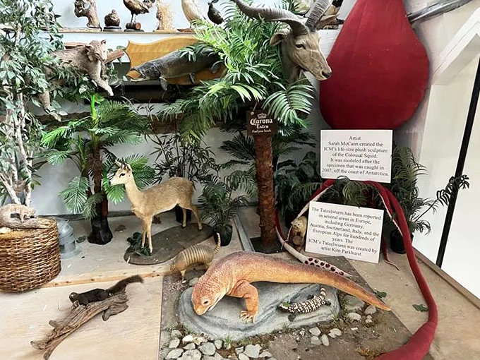 A tropical paradise diorama featuring exotic creatures and a komodo-like reptile, where fantasy and natural history blend seamlessly together.