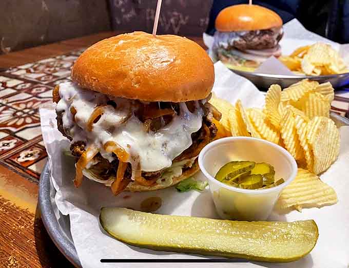 The mushroom burger proves that even fungi deserve the royal treatment, with melted cheese cascading down like a dairy waterfall.