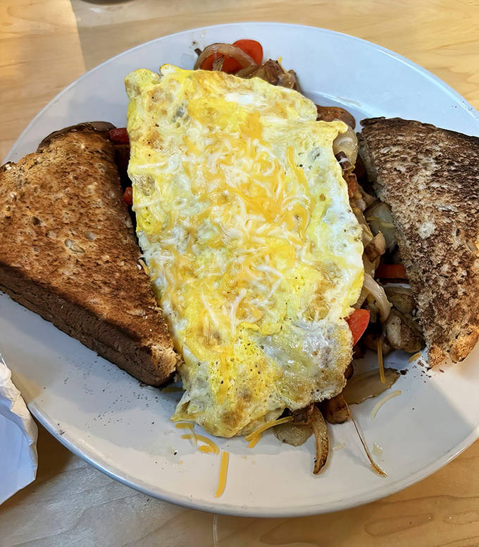 Nick's Mess Skillet lives up to its name &ndash; a glorious heap of potatoes, veggies, eggs, and cheese that somehow manages to be both chaotic and perfect.