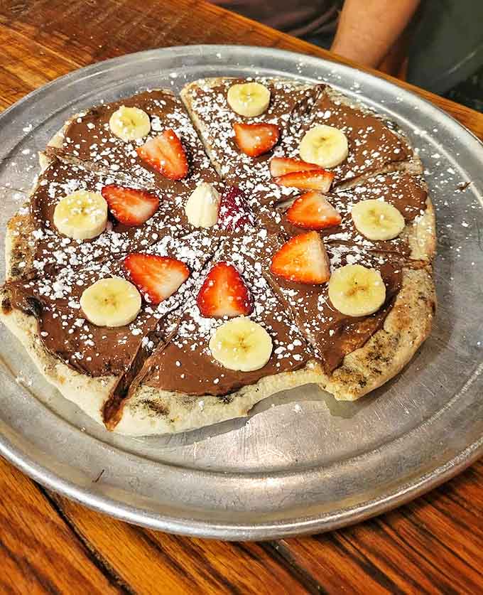 Yes, that's Nutella on pizza dough with fresh fruit, and yes, it's exactly as dangerously delicious as it sounds.