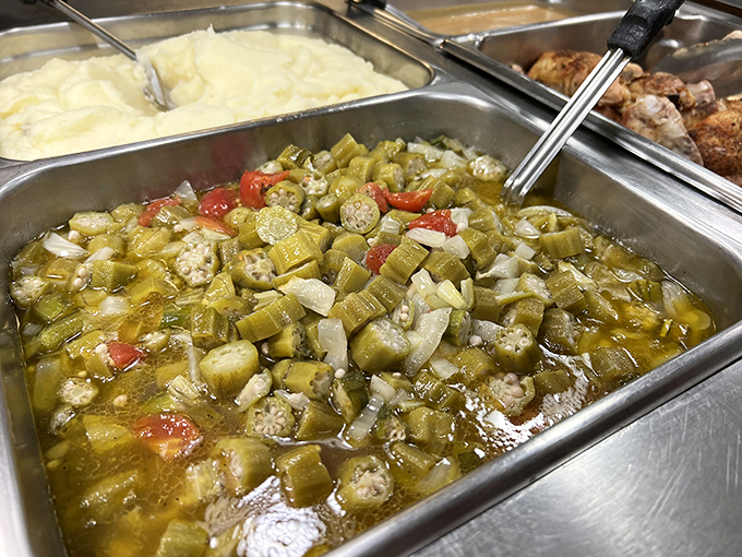 Okra and tomato stew simmering away &ndash; converting skeptics one spoonful at a time with its tangy, savory Southern charm.