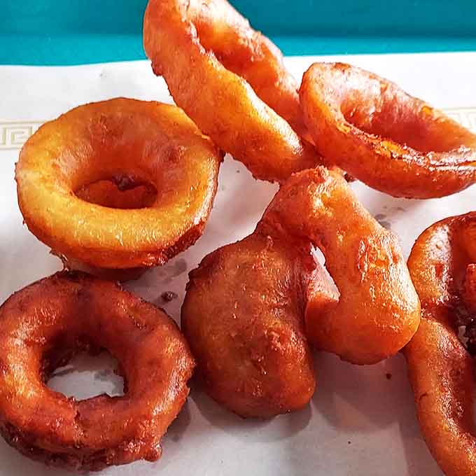 Crispy, golden onion rings with that perfect crunch-to-softness ratio that chain restaurants have spent decades trying to replicate.