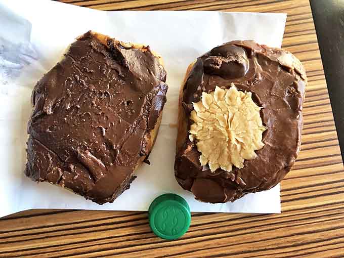These chocolate-frosted beauties aren't just donuts &ndash; they're edible works of art with those signature decorative touches that scream "Schuler's."