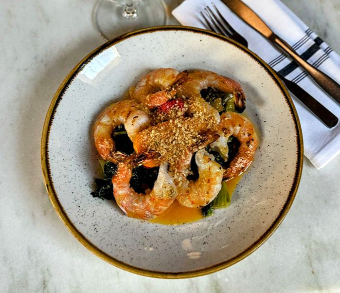 Limoncello Shrimp arrives like sunshine on a plate, bright and beautiful enough to photograph before devouring completely.