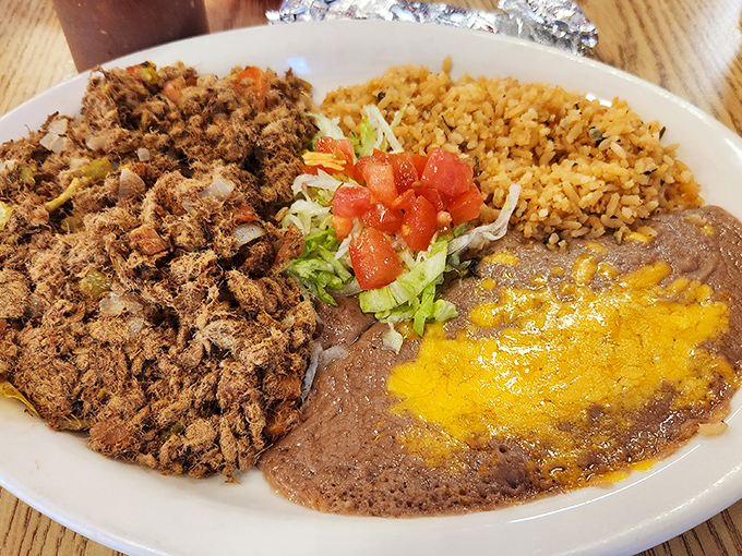 Picadillo Plate: Comfort food that speaks fluent Spanish &ndash; seasoned ground beef nestled beside rice that's actually worth eating, not just pushing around your plate.